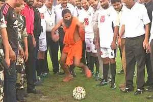 Baba Ramdev promotes football for PM Narendra Modi’s Swachh Bharat Abhiyan