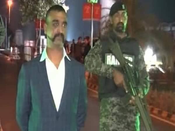 Wing Commander Abhinandan accompanied by IAF Group Captain Joy Thomas Kurien